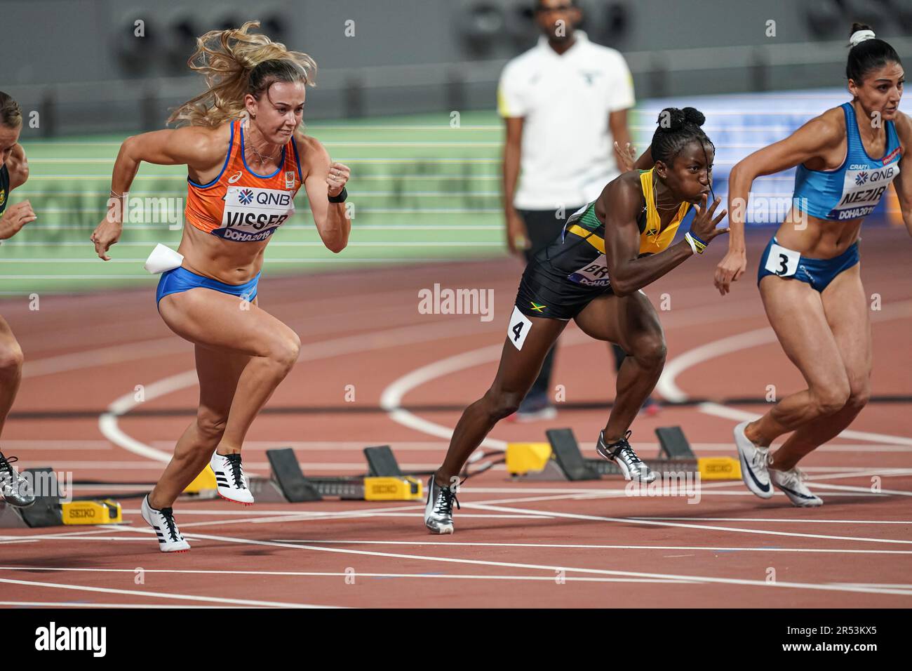 Nadine Visser running the 100m hurdles at the 2019 World Athletics ...