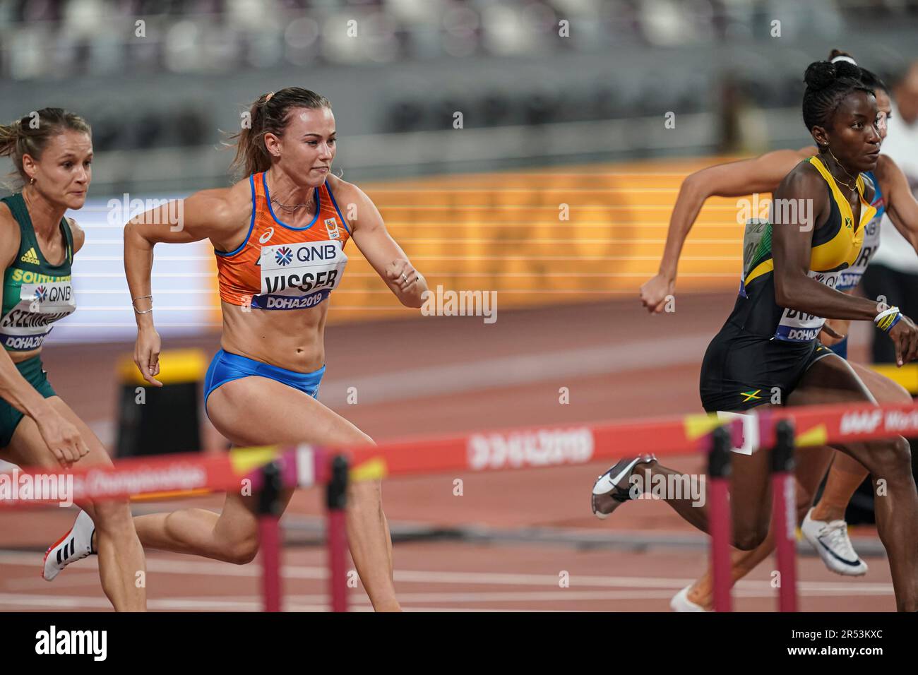 Nadine Visser running the 100m hurdles at the 2019 World Athletics ...