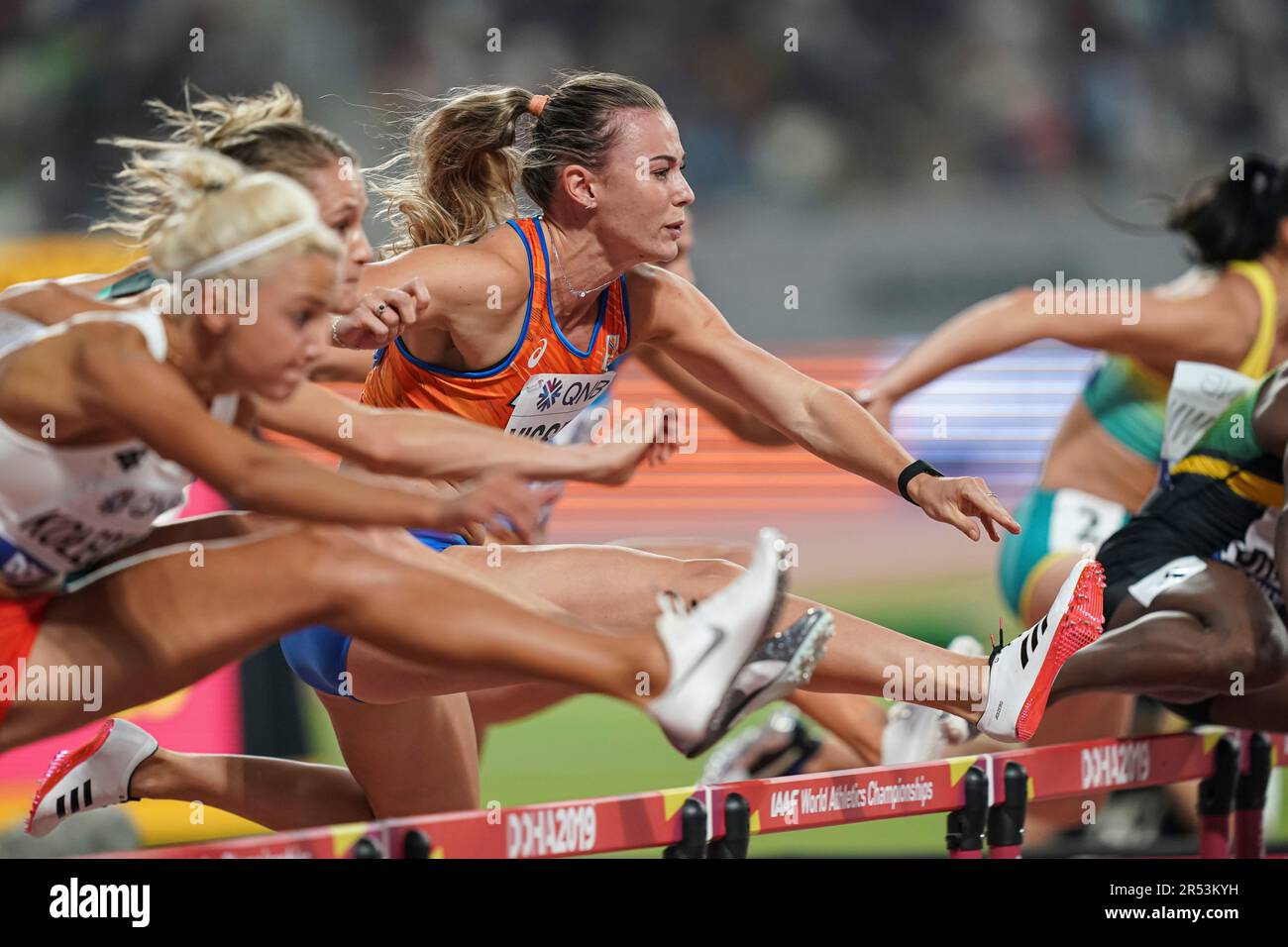 Nadine Visser running the 100m hurdles at the 2019 World Athletics ...