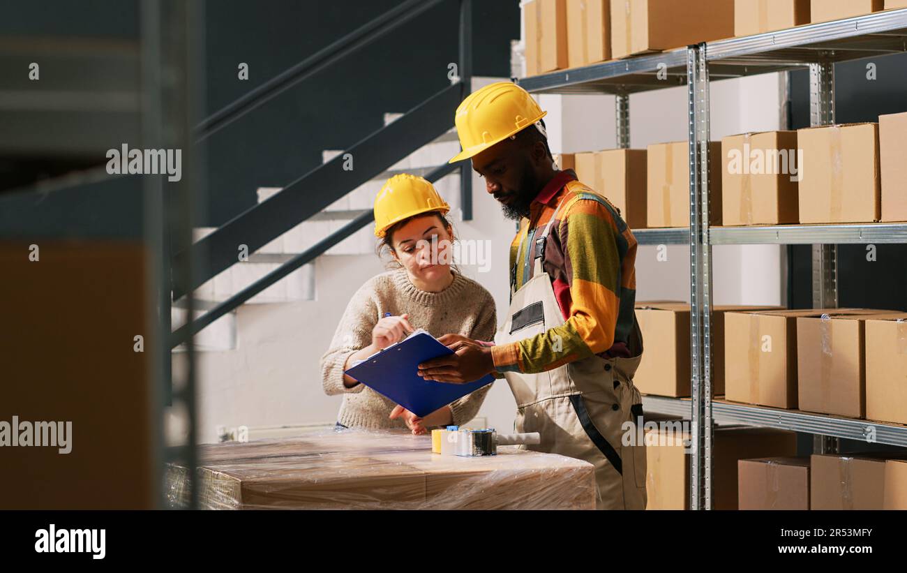 African american people packing products hi-res stock photography and ...