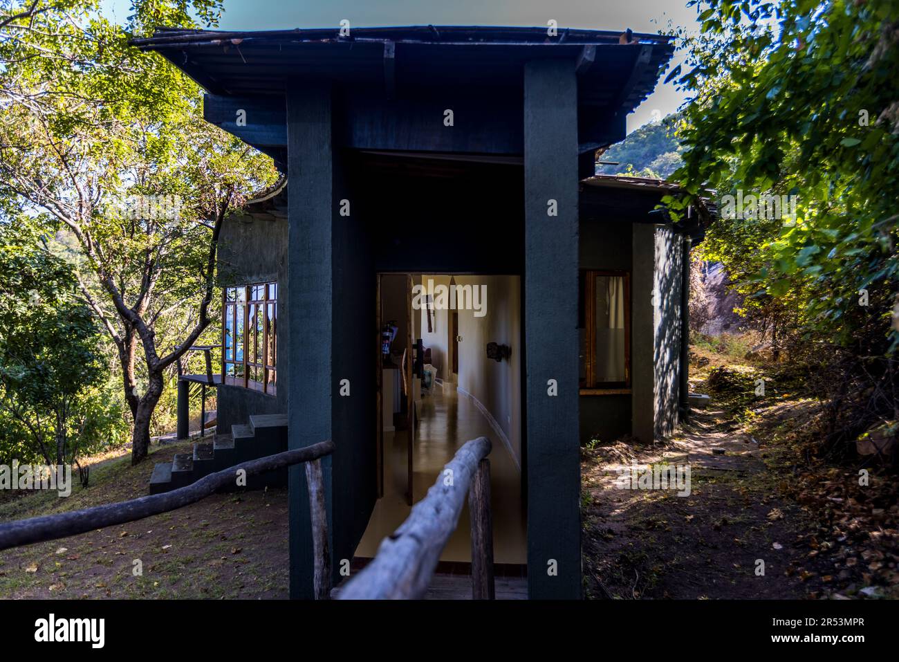 Entrance to a guest villa built into the hillside at Pumulani Lodge ...