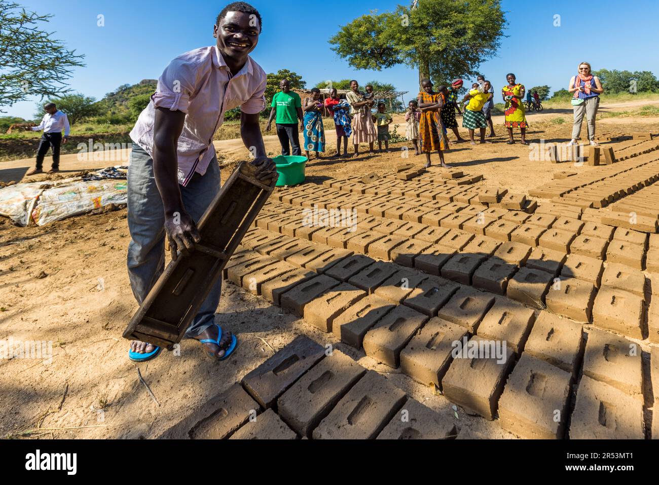 In many villages in Malawi, the bricks for the houses are formed from ...