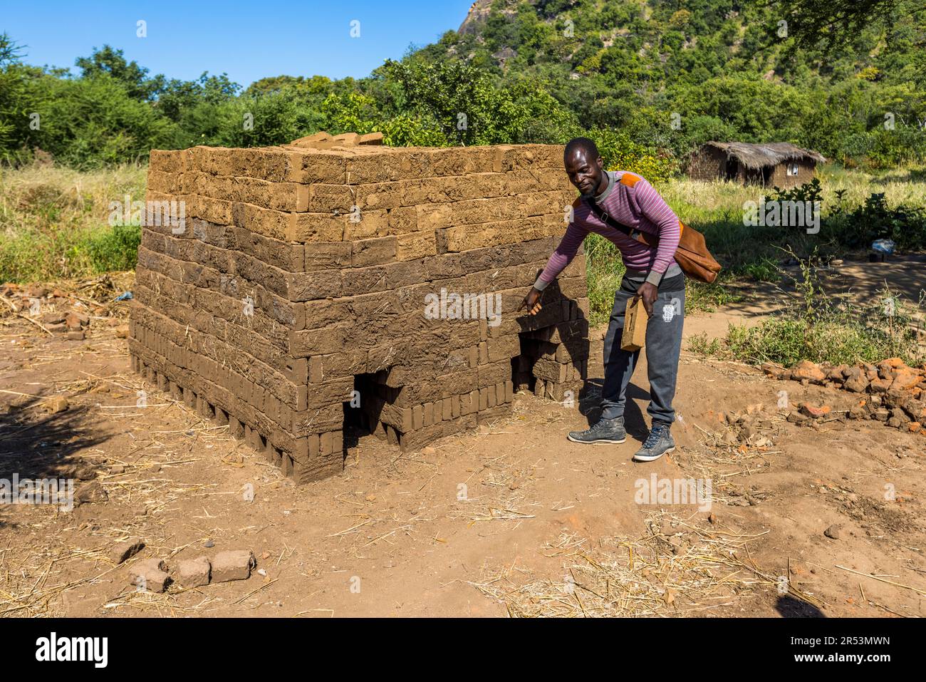In many villages in Malawi, the bricks for the houses are formed from clay and baked with wood ...