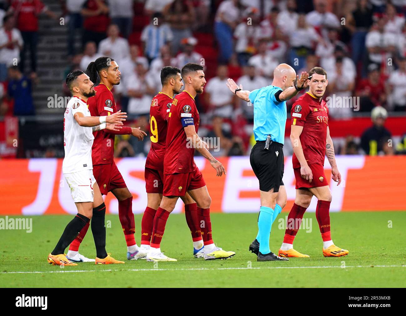 Referee Anthony Taylor gestures after consulting the pitchside VAR to ...