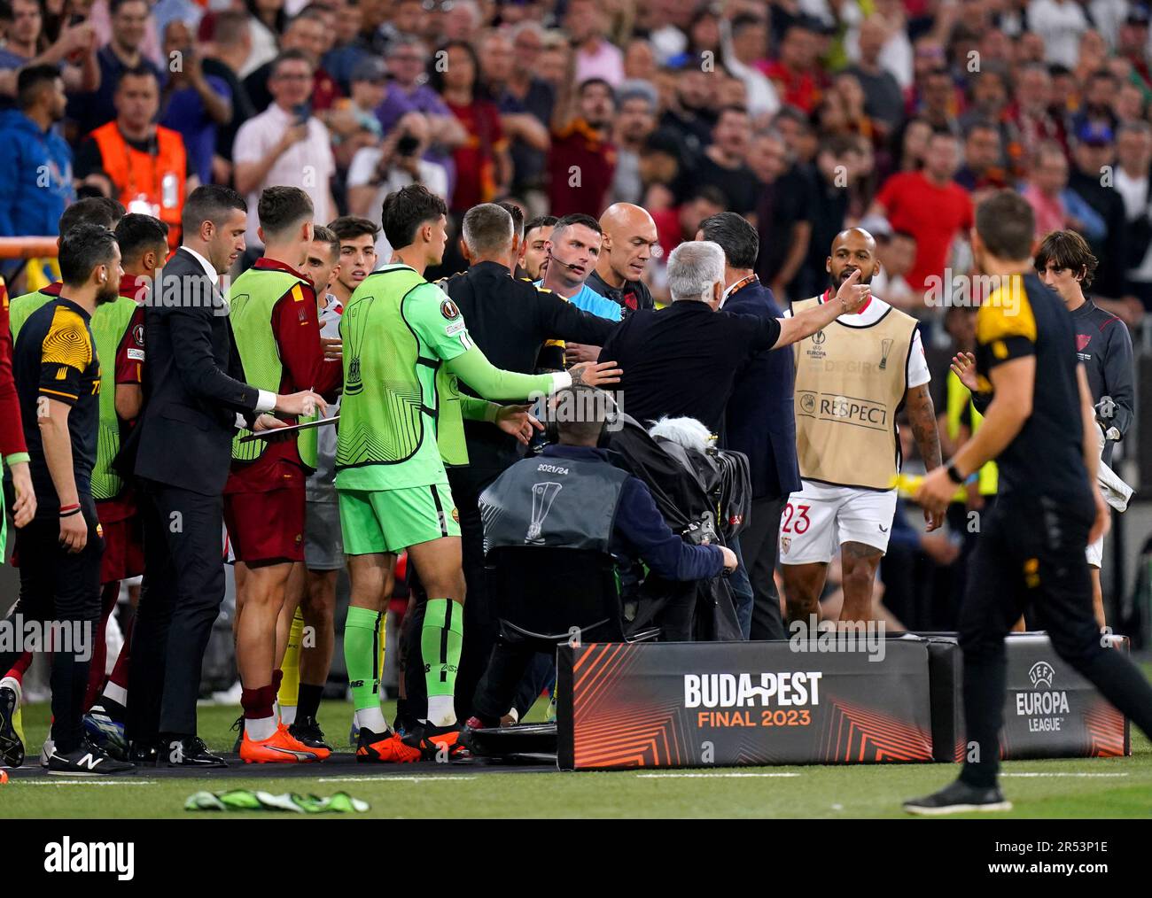 Fourth official Michael Oliver steps in as tempers flare between the ...