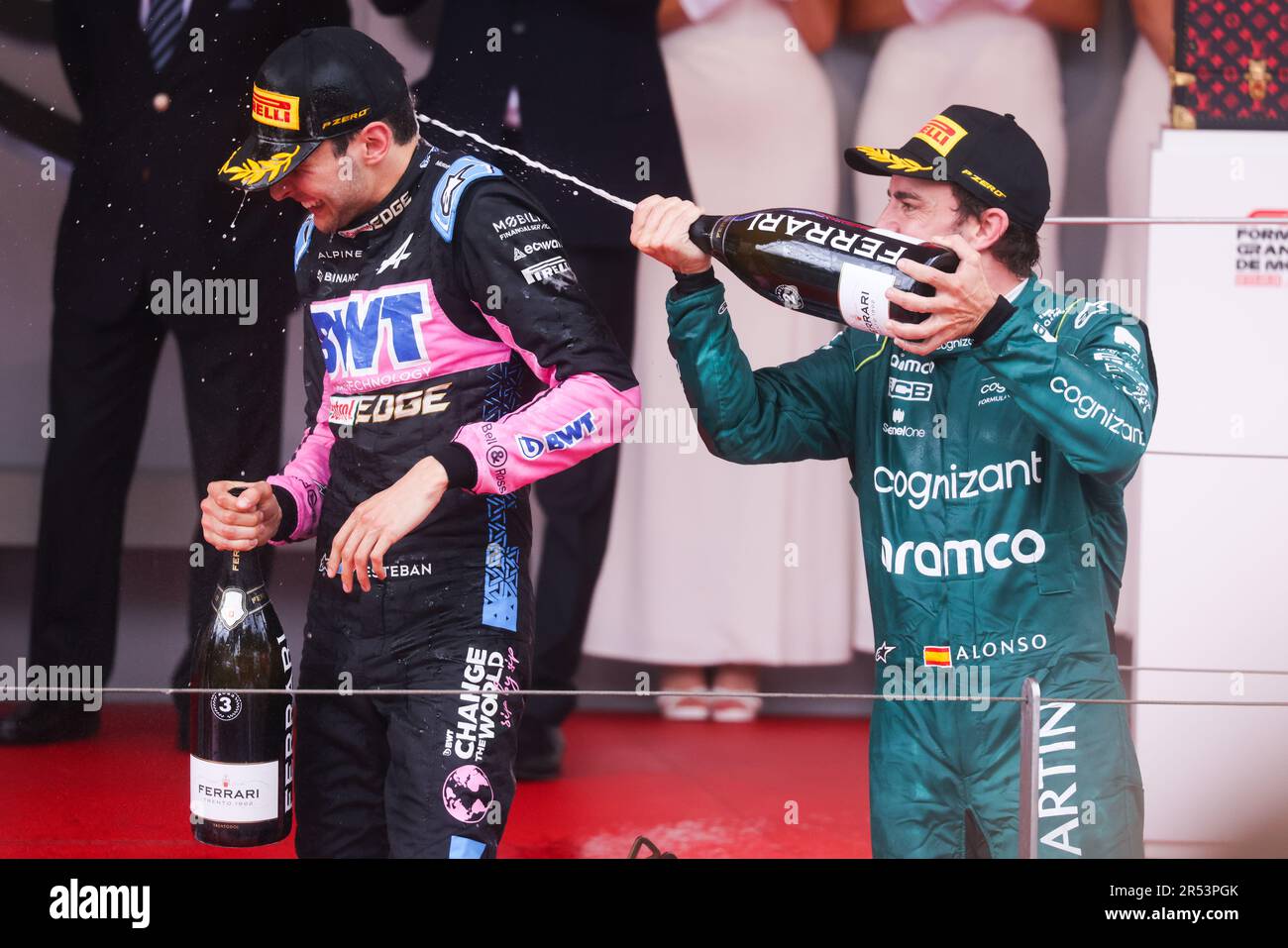 Esteban Ocon of Alpine and Fernando Alonso of Aston Martin are seen on podium after F1 Grand ...