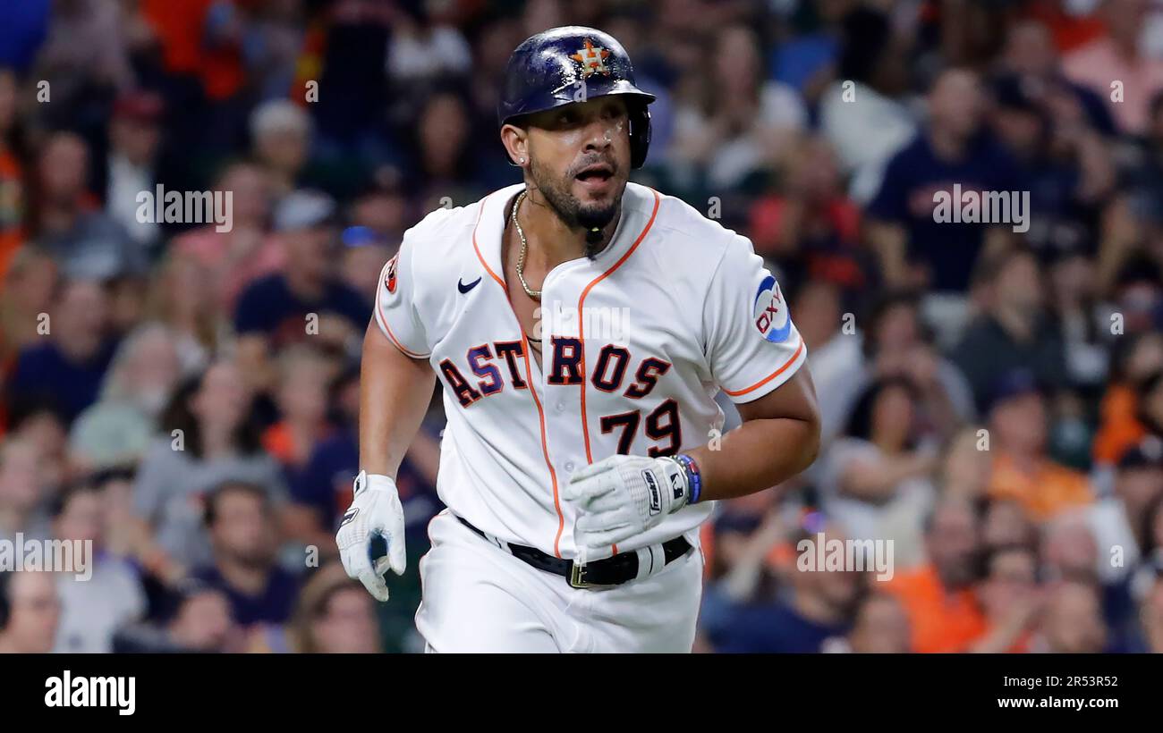 Houston Astros' Jose Abreu runs out a hit against the Minnesota Twins ...