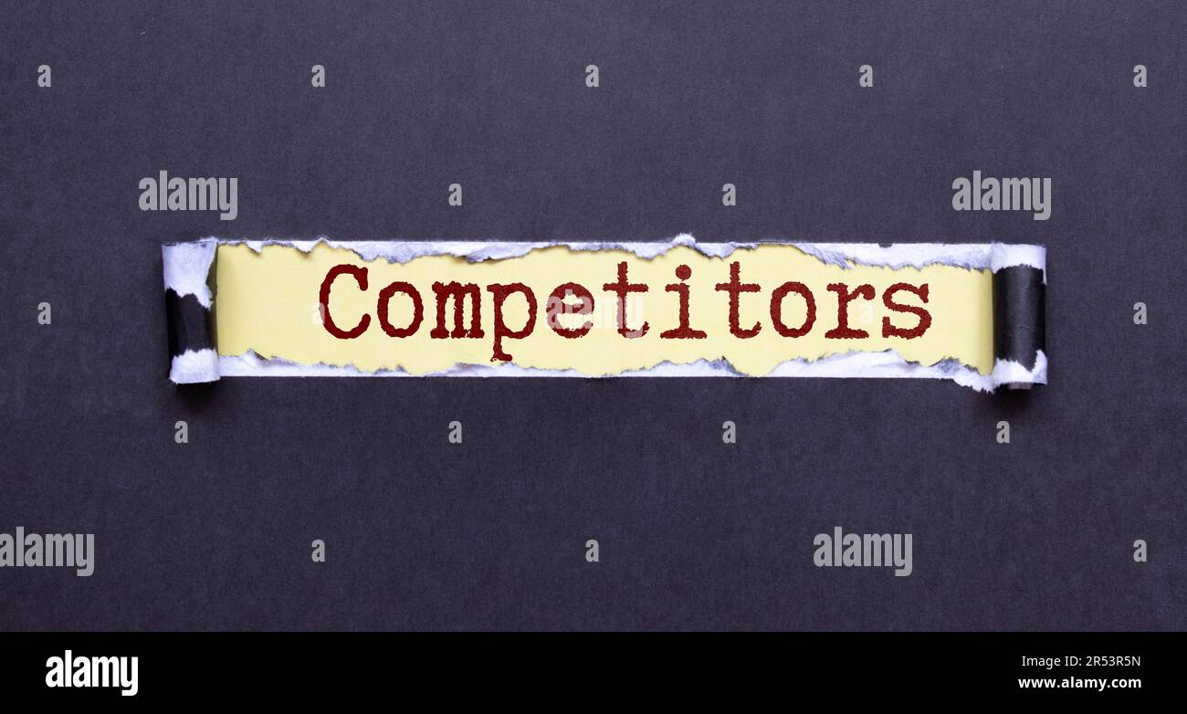 Reports and color charts are on the table. There are also red pens ...