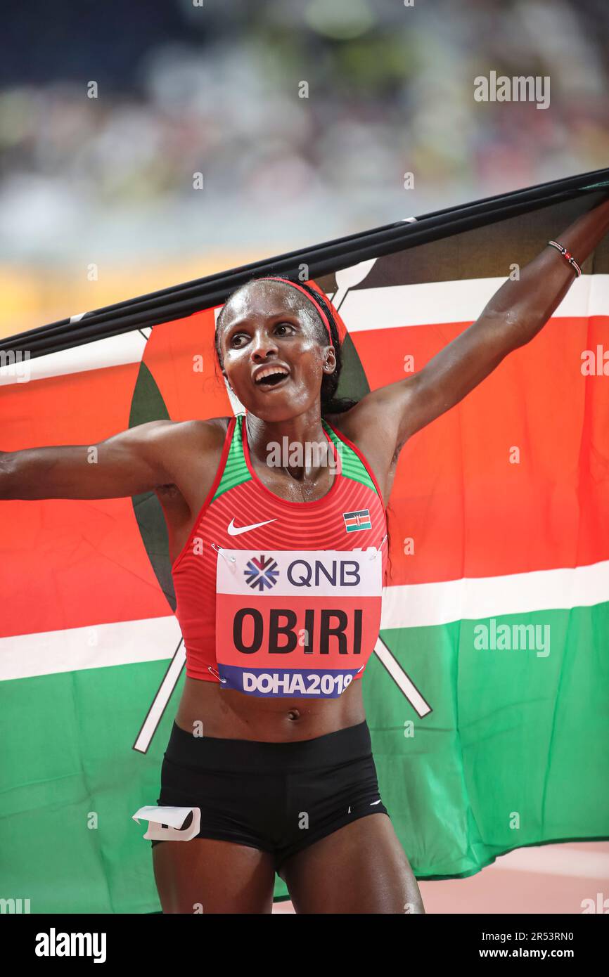 Hellen Obiri celebrating with her country's flag in the 5000 meters at ...