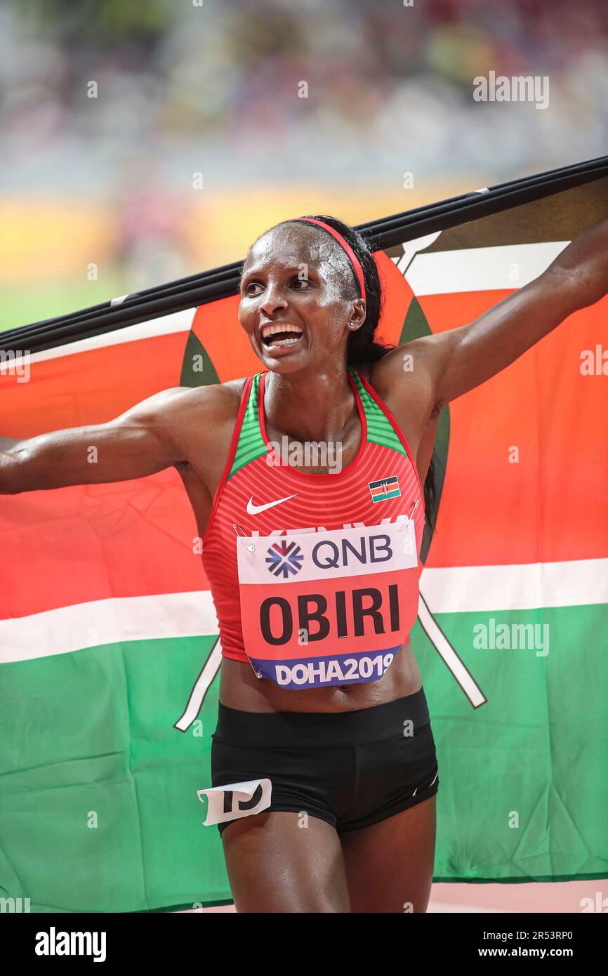 Hellen Obiri celebrating with her country's flag in the 5000 meters at ...