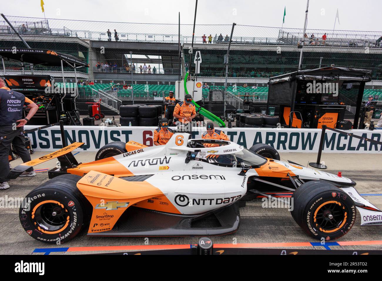Crew of racing driver Felix Rosenqvist (6) of Sweden taking car from ...