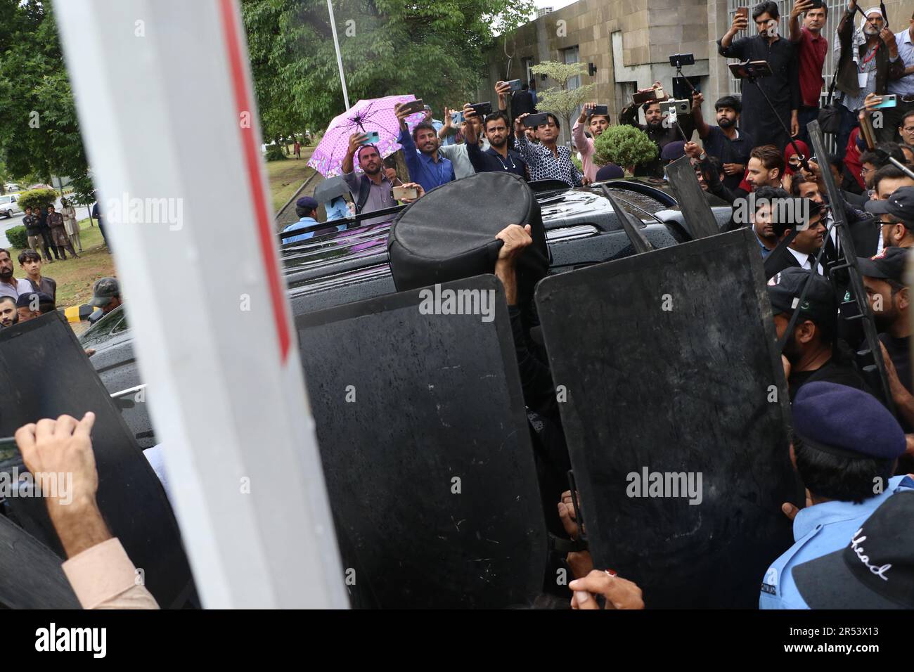 Islamabad, Pakistan. 31st May, 2023. A vehicle carrying former Pakistan's Prime Minister Imran ...