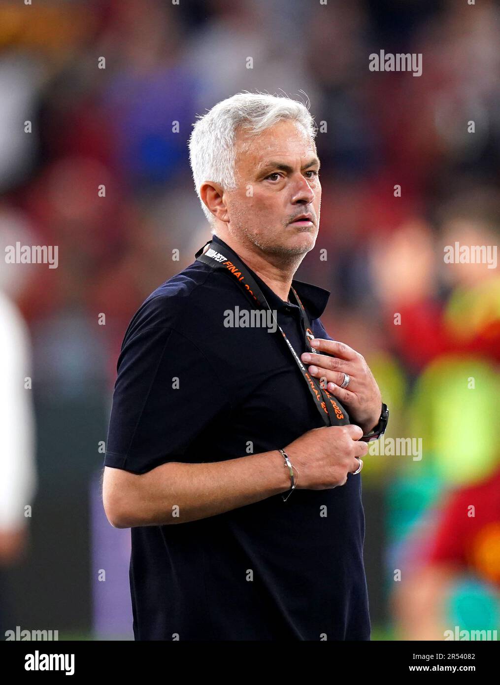 Roma manager Jose Mourinho walks off after being presented with his ...