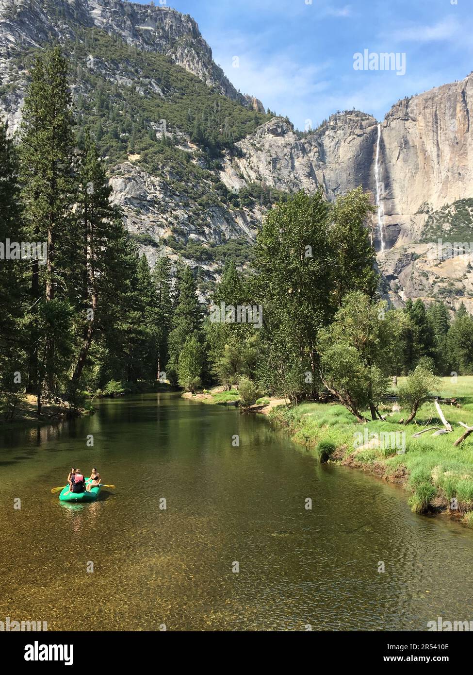 A family floats down the Merced River in their inflatable raft as they ...
