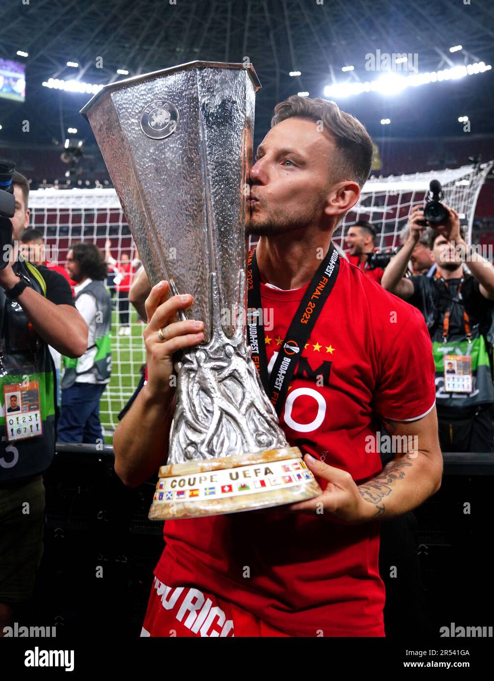 Sevilla's Ivan Rakitic kisses the UEFA Europa League trophy as he ...