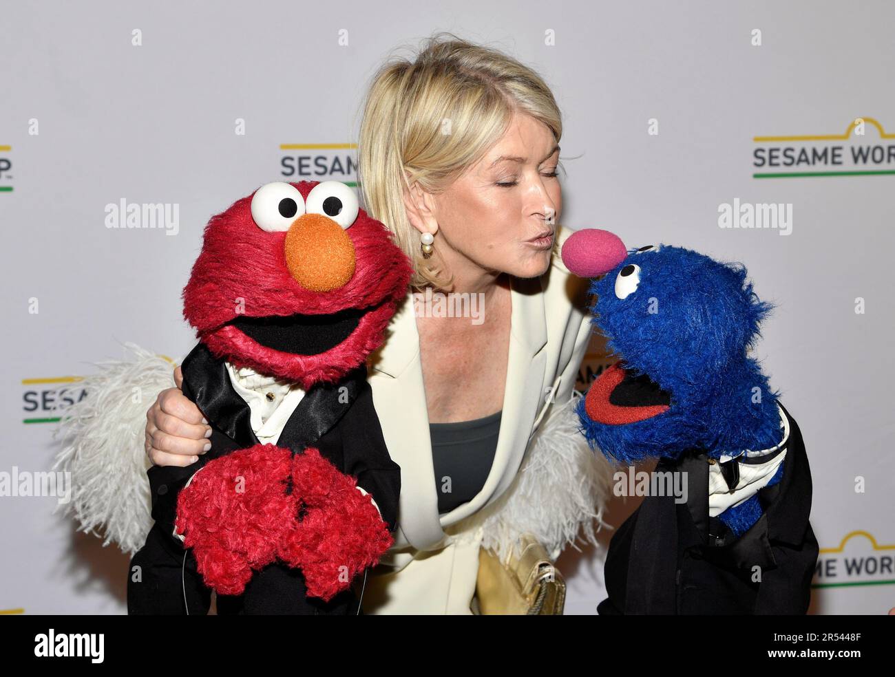 Martha Stewart, center, poses with Elmo, left, and Grover at the Sesame ...
