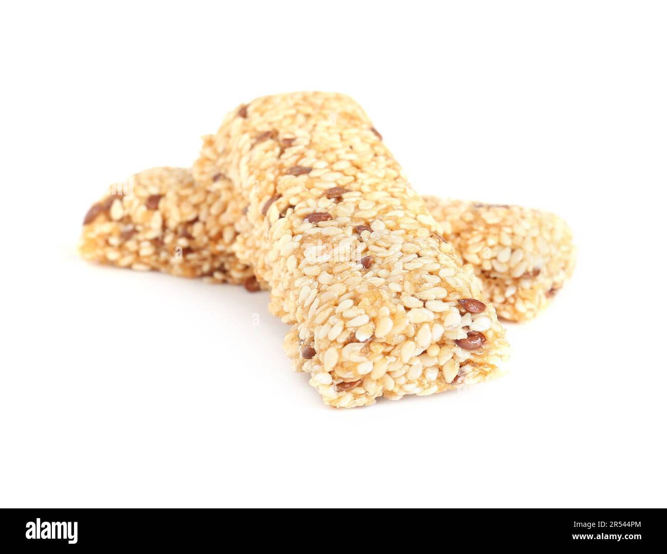 Tasty sesame seed bars isolated on white Stock Photo - Alamy