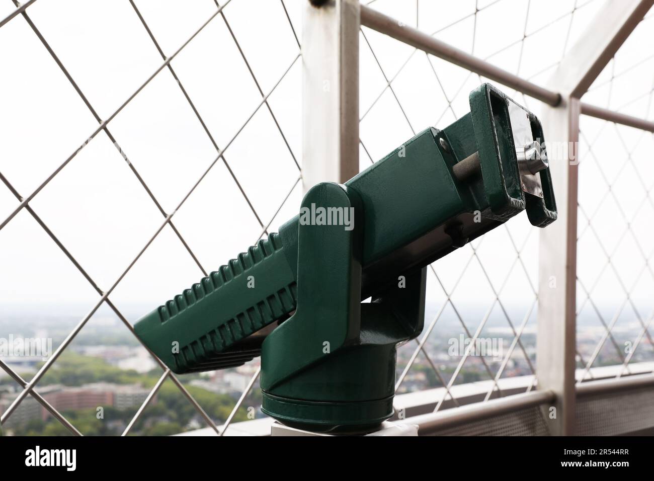 Green metal tower viewer on observation deck Stock Photo - Alamy