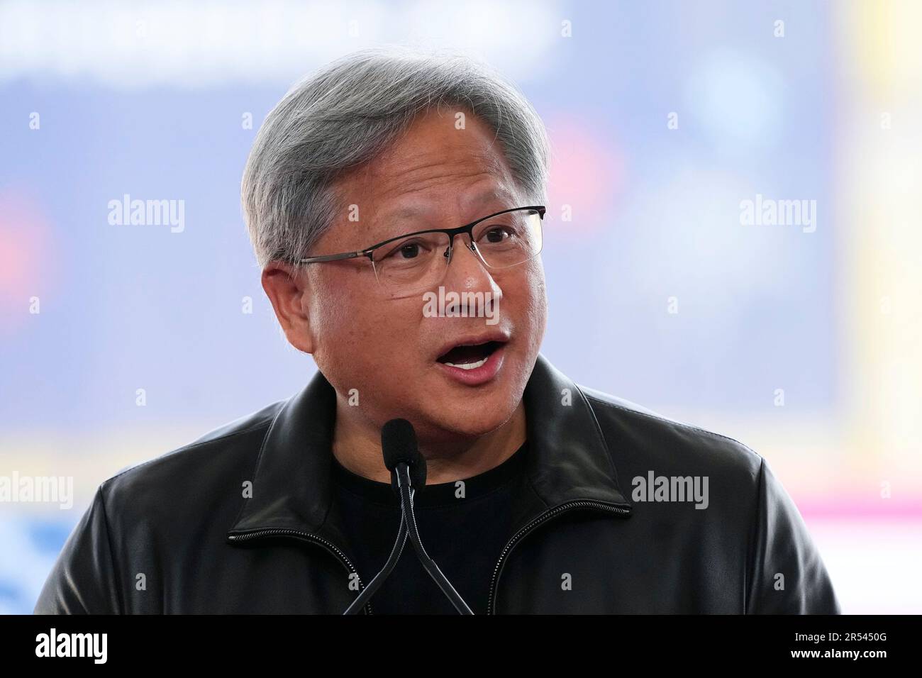 FILE - Nvidia Co-founder, President and CEO Jensen Huang speaks at the ...