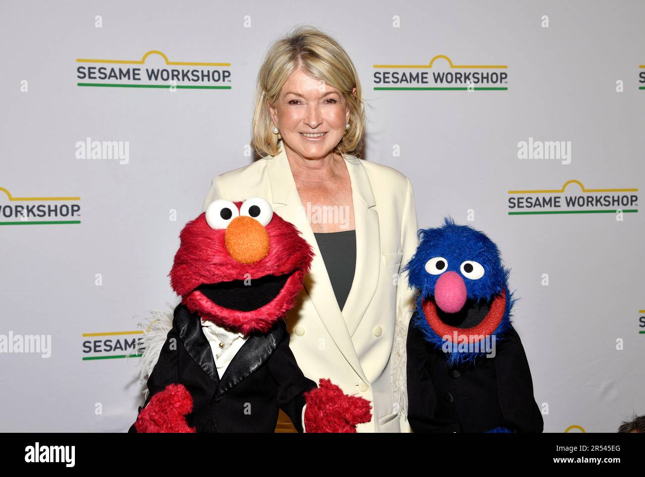 Martha Stewart, center, poses with Elmo, left, and Grover at the Sesame ...