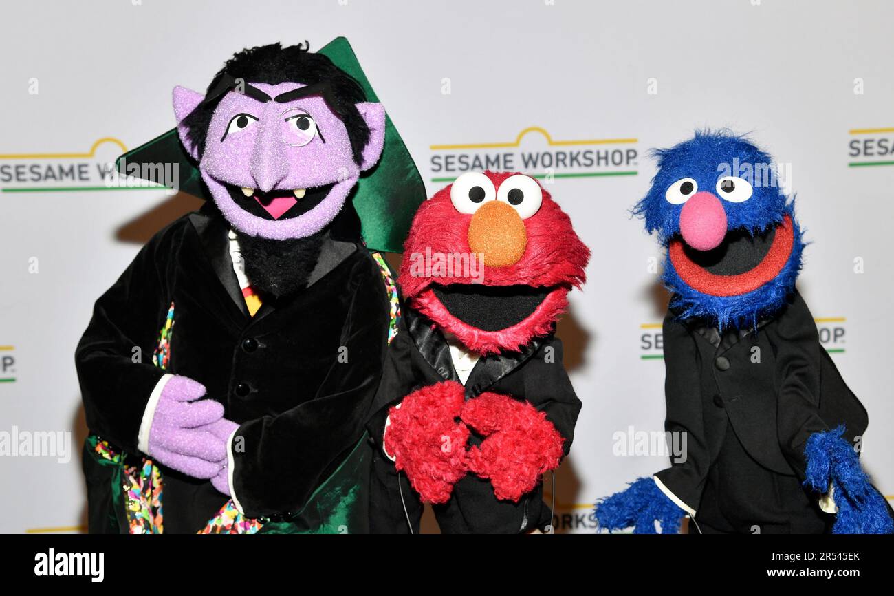Sesame Street characters Count von Count, left, Elmo and Grover pose together at the Sesame ...