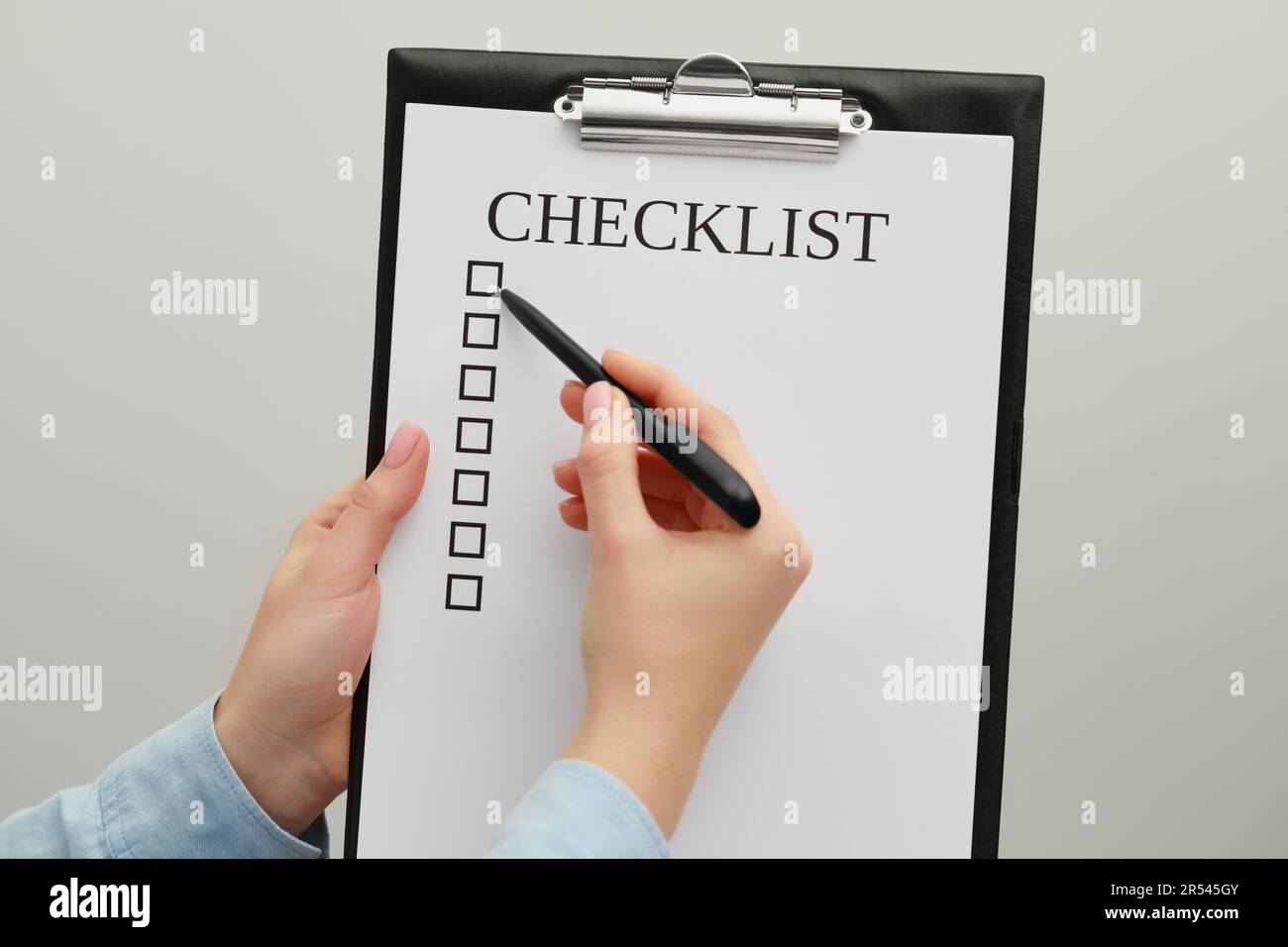 Woman filling audit checklist hi-res stock photography and images - Alamy
