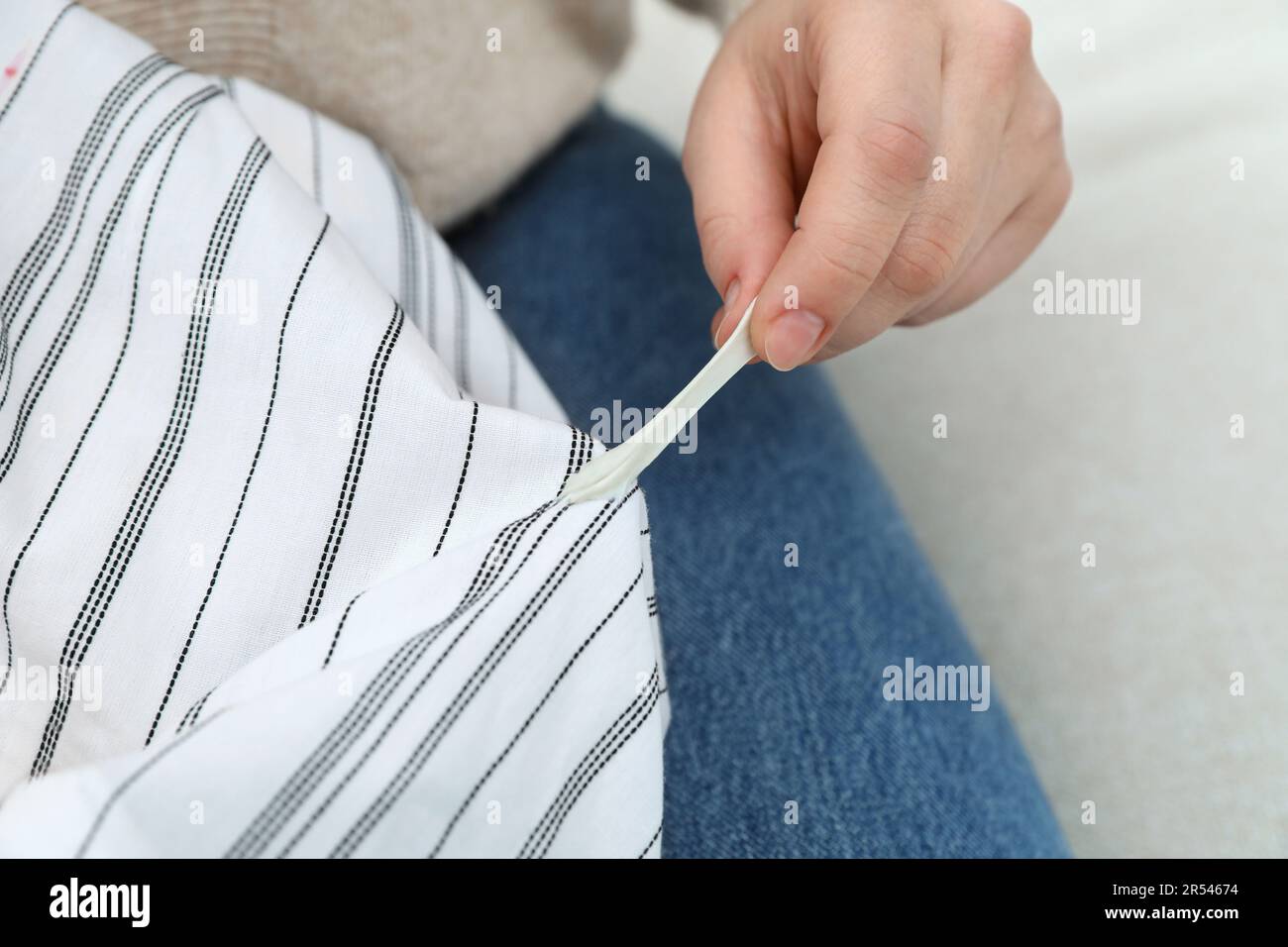 Woman rubbish clothes hi-res stock photography and images - Alamy