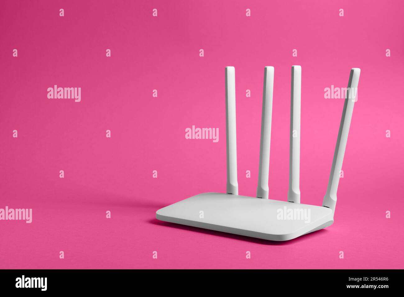 New white Wi-Fi router on pink background. Space for text Stock Photo ...