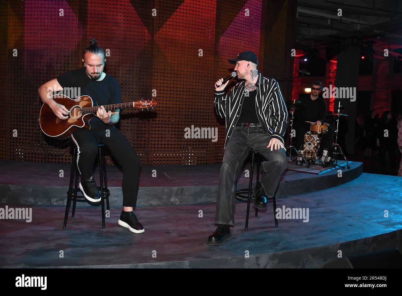 Moscow. Singer Zvonkiy (Andrey Lyskov) (right) performs at the awards ...