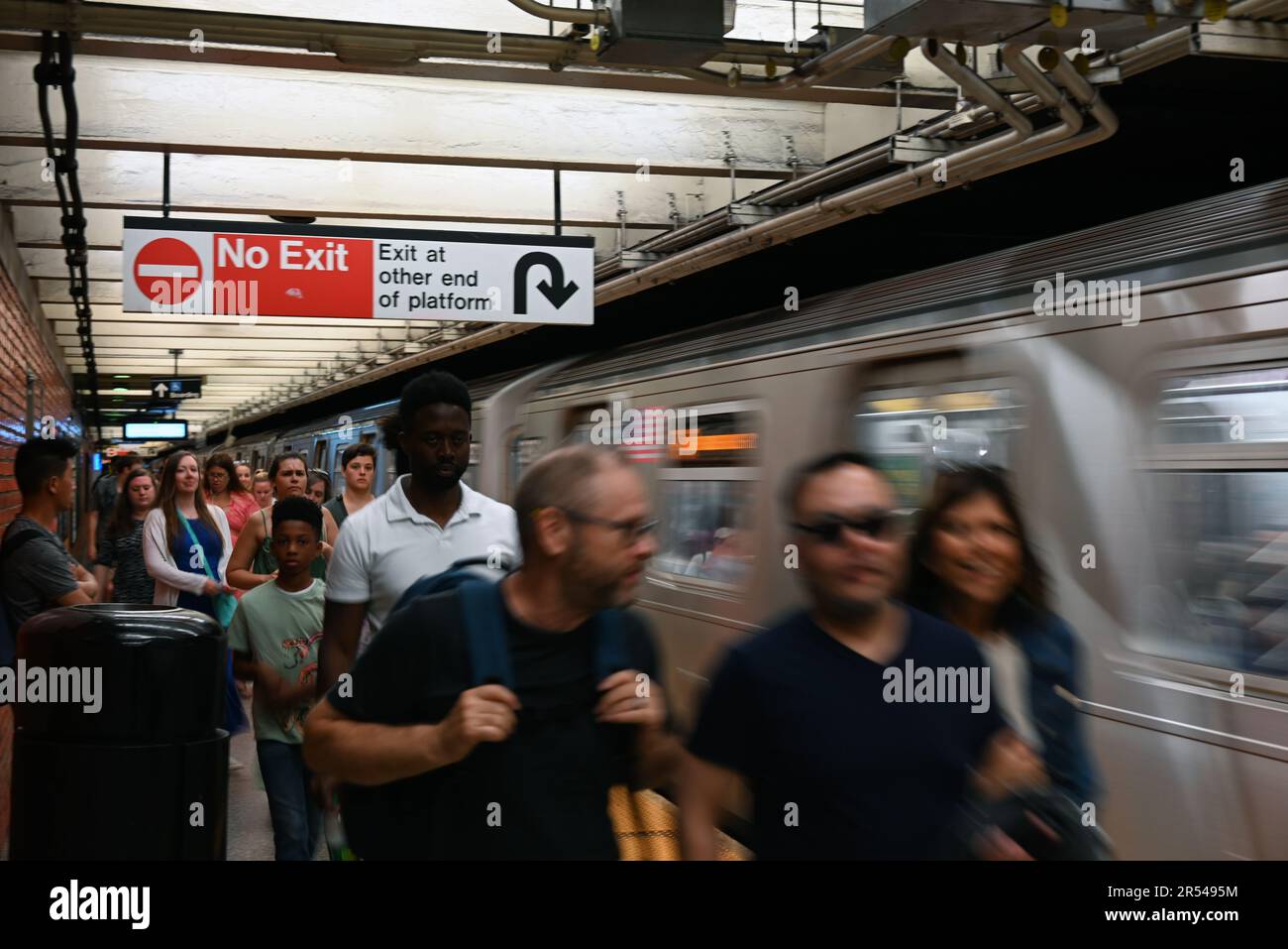 Riders exit the platform as a MTA subway train leaves the 47th Street ...