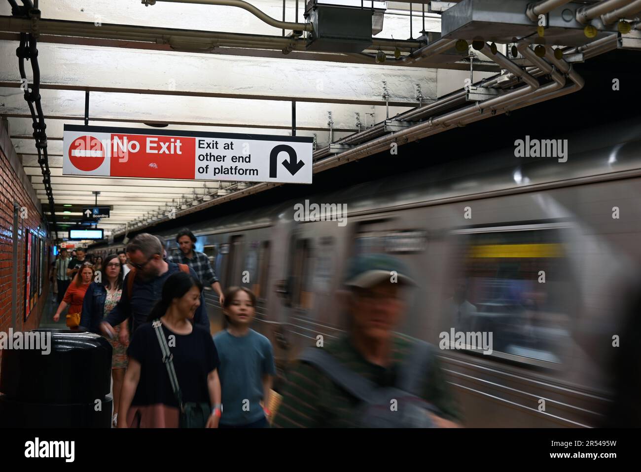 Passengers exit the platform as a MTA subway train leaves the 47th ...