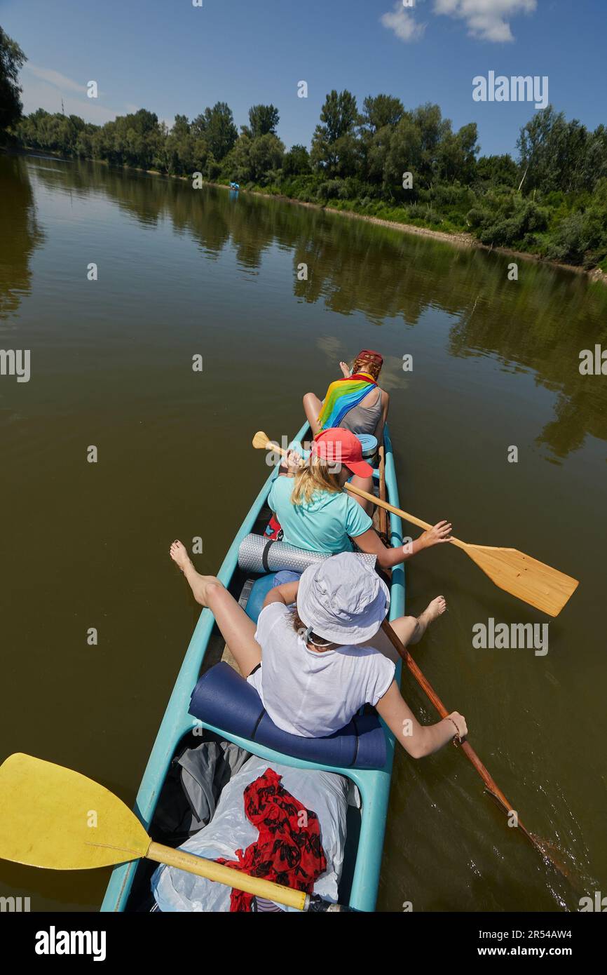 Canoeing on a river, girls in the boat Stock Photo - Alamy