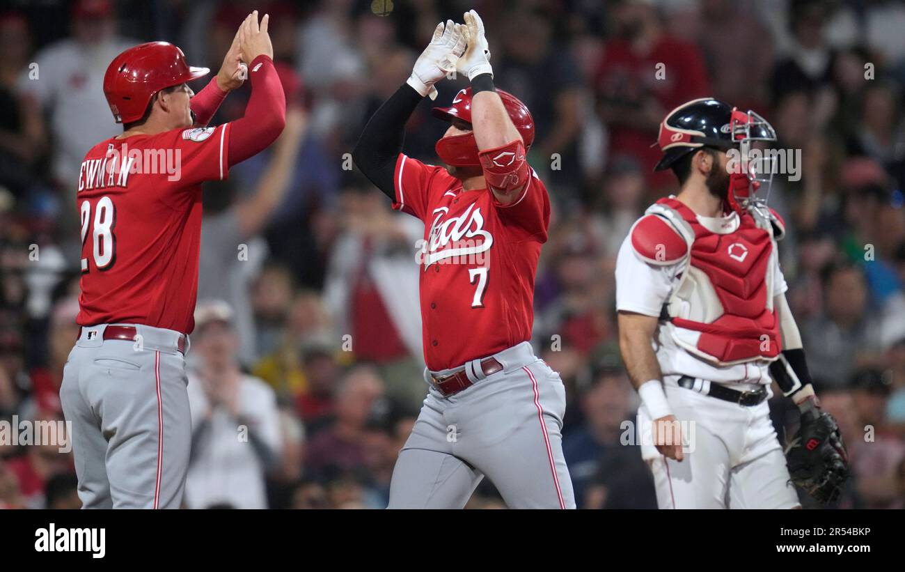 Cincinnati Reds' Spencer Steer (7) crosses home plate and celebrates ...