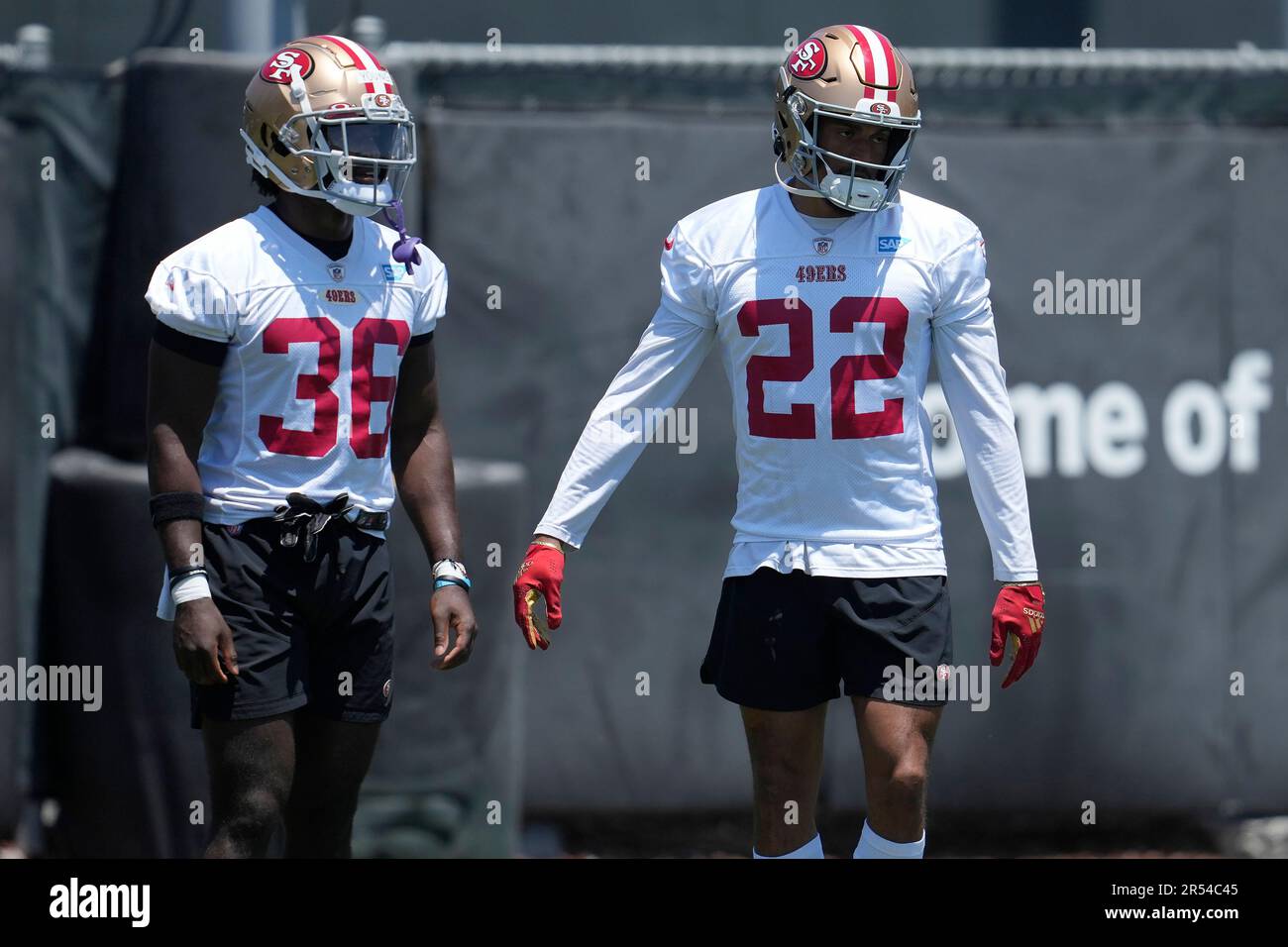 San Francisco 49ers' Avery Young, left, and Isaiah Oliver take part in ...