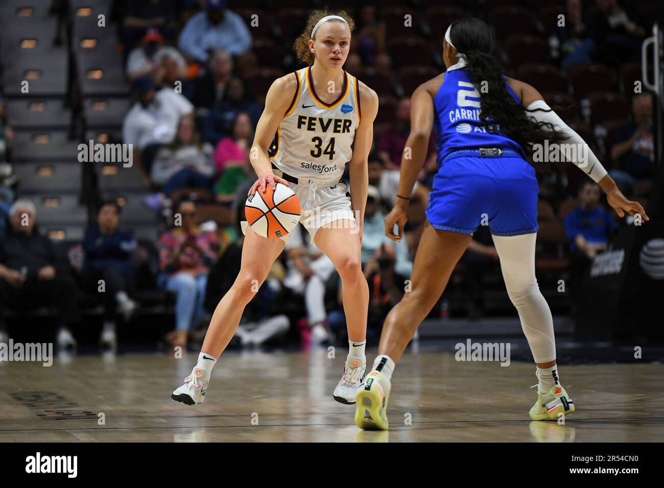 UNCASVILLE, CT - MAY 30: Indiana Fever guard Grace Berger (34) handles ...