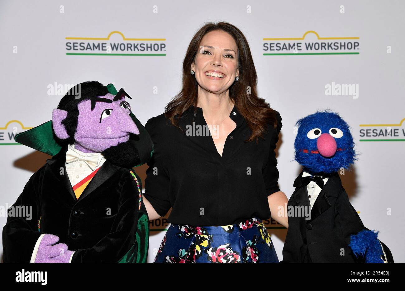 CNN anchor Erica Hill, center, poses with Count von Count, left, and ...