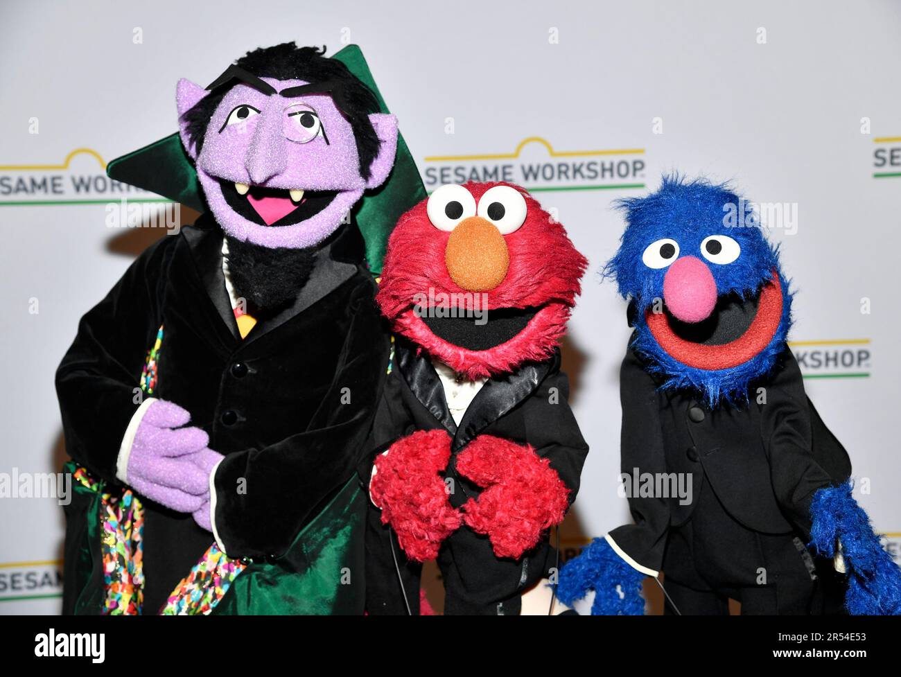 Sesame Street muppets Count von Count, left, Elmo and Grover pose together at the Sesame ...