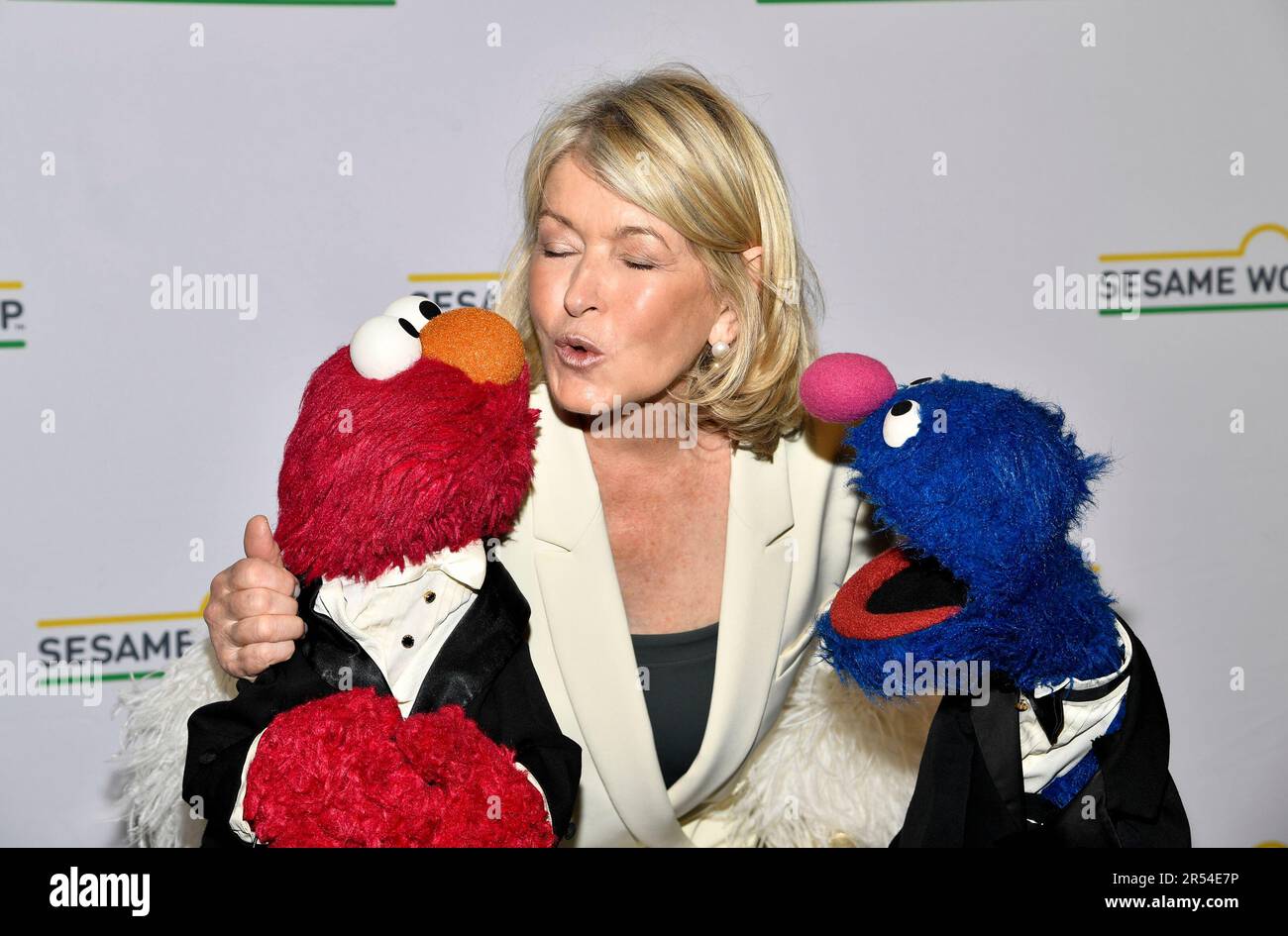 Martha Stewart, center, poses with Elmo, left, and Grover at the Sesame ...