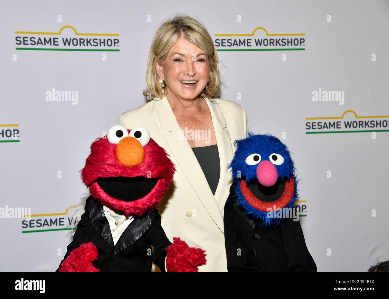 Martha Stewart, center, poses with Elmo, left, and Grover at the Sesame ...