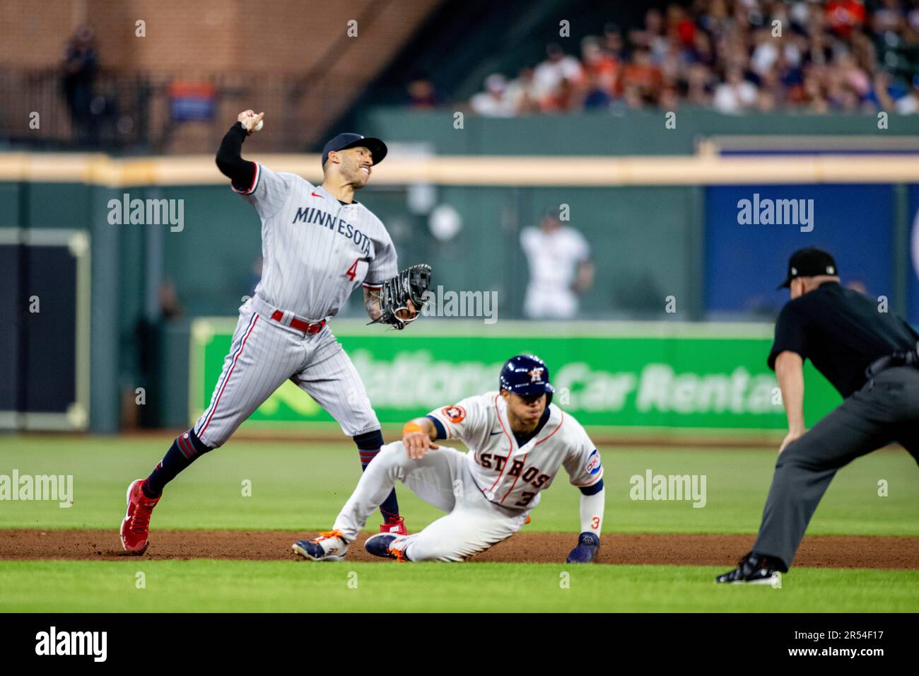 Minnesota Twins shortstop Carlos Correa (4) turns a double-play as ...