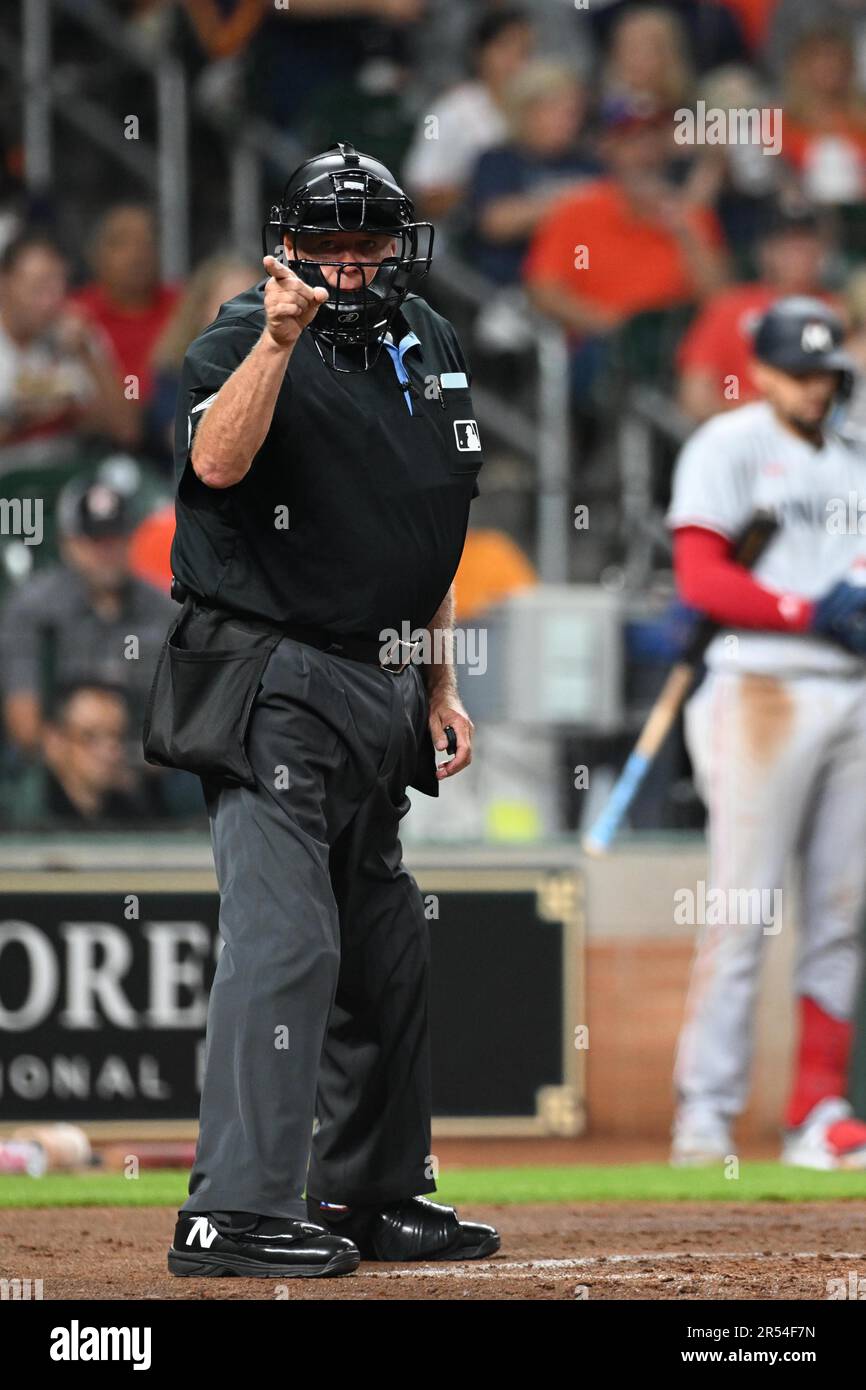 Home plate umpire Jerry Layne (24) calls a strike in the top of the ...