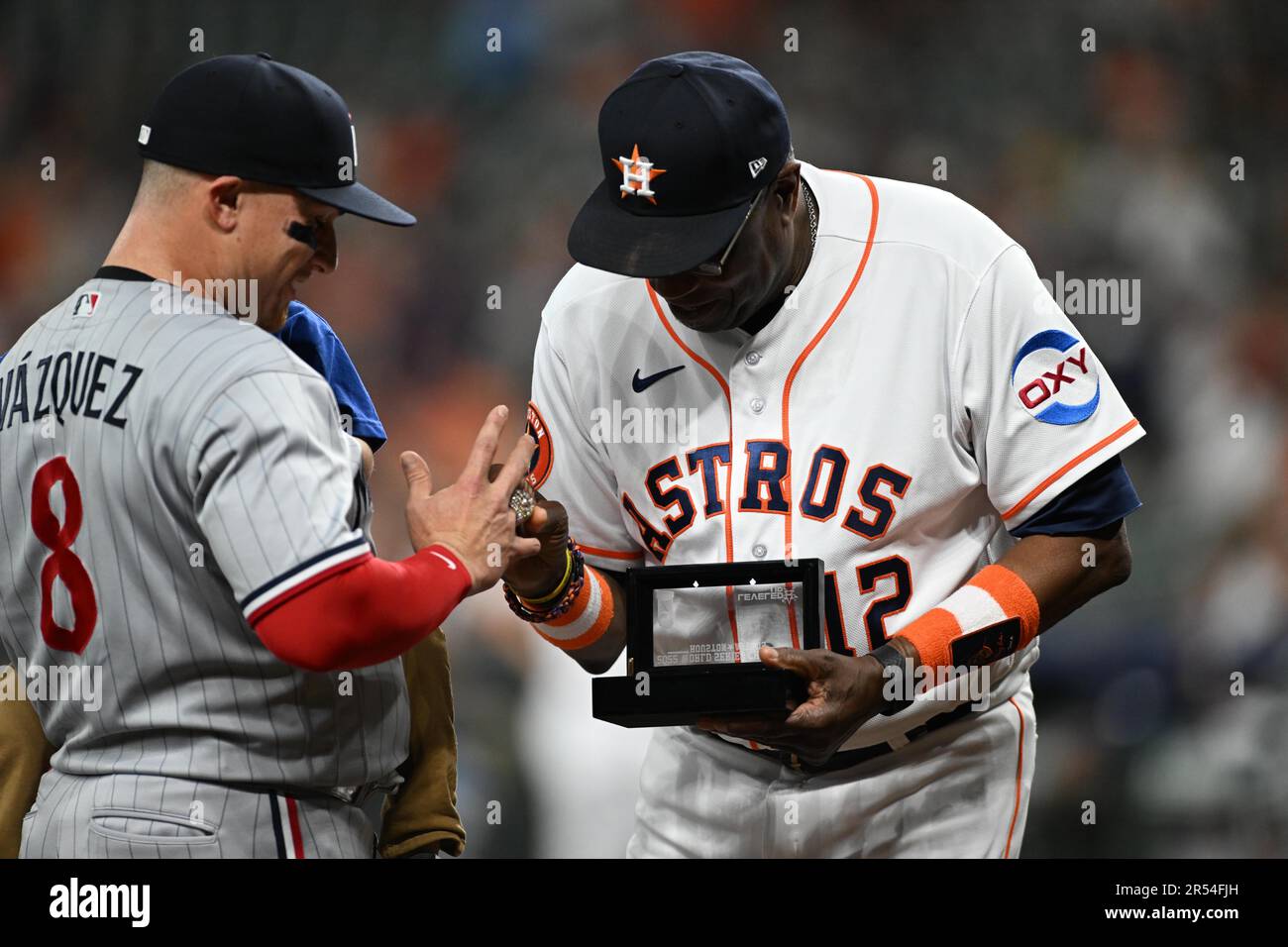 Houston Astros manager Dusty Baker Jr. (12) places a 2022 World Series ...