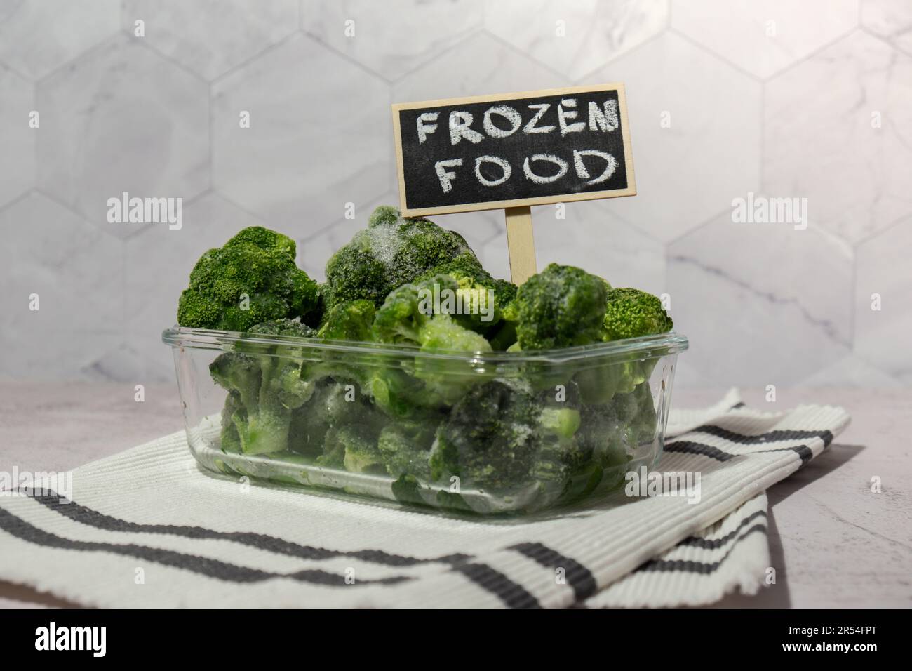 Frozen food broccoli florets with blackboard label and text FROZEN FOOD ...