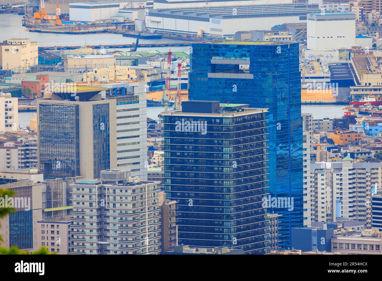 Tall glass office buildings and mid-rise apartment buildings in city ...