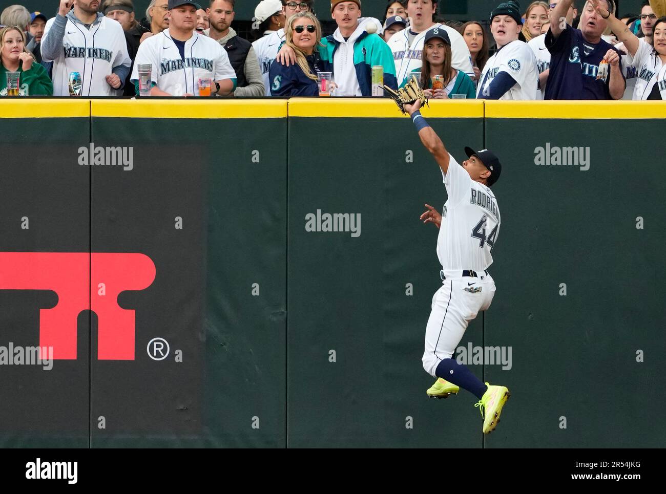 Seattle Mariners center fielder Julio Rodriguez jumps to catch a long ...