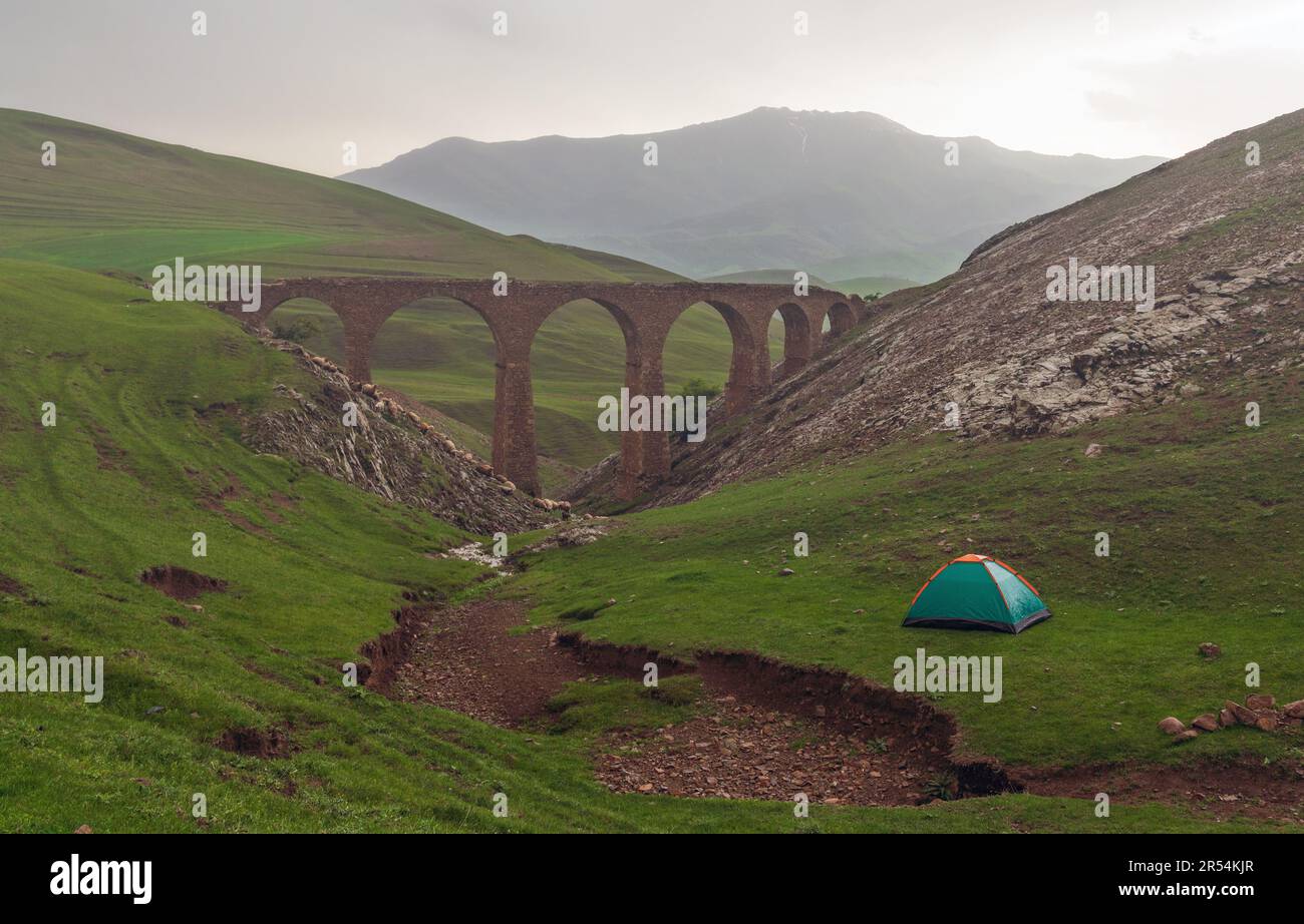 An ancient stone bridge in the suburbs of the city of Gadabay, built by ...