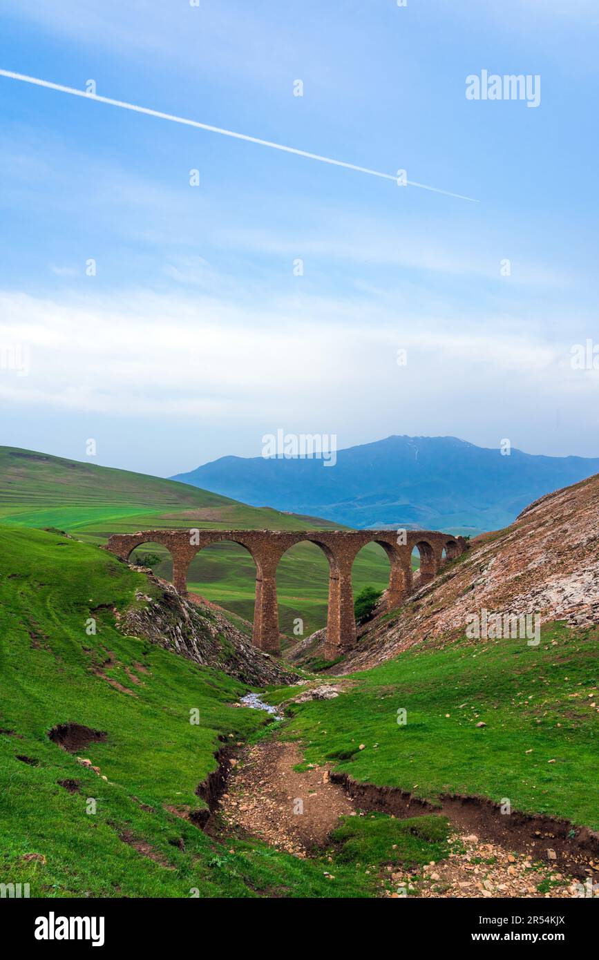 An ancient stone bridge in the suburbs of the city of Gadabay, built by ...
