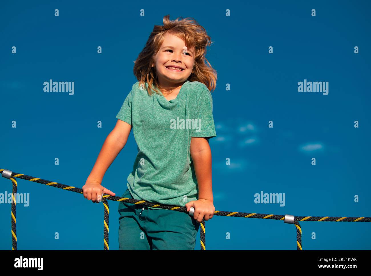 Boy playing in the playground. Kids play outdoor Stock Photo - Alamy