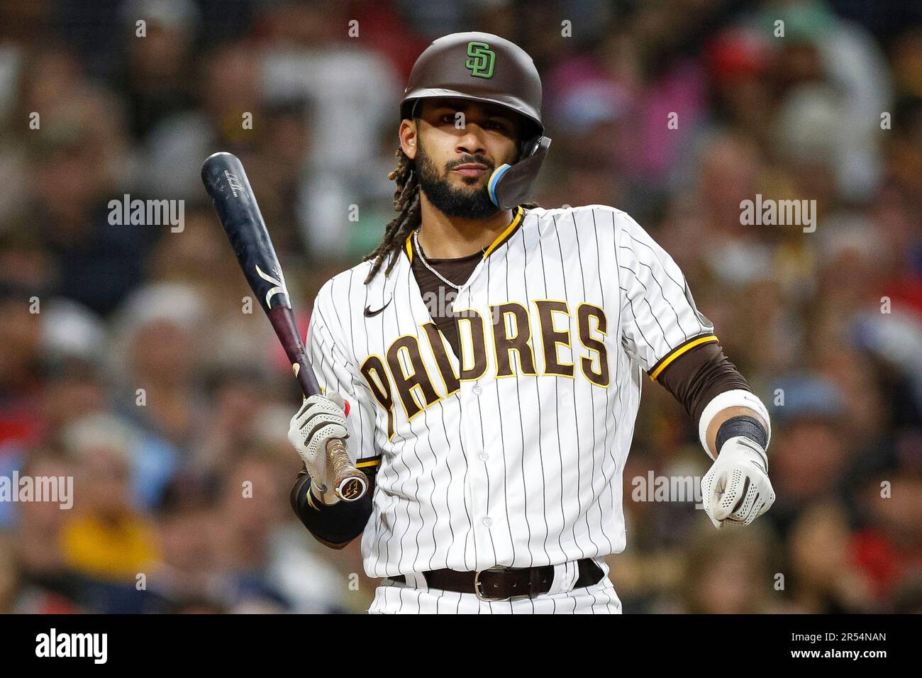 San Diego Padres' Fernando Tatis Jr. reacts after a pitch in the third ...