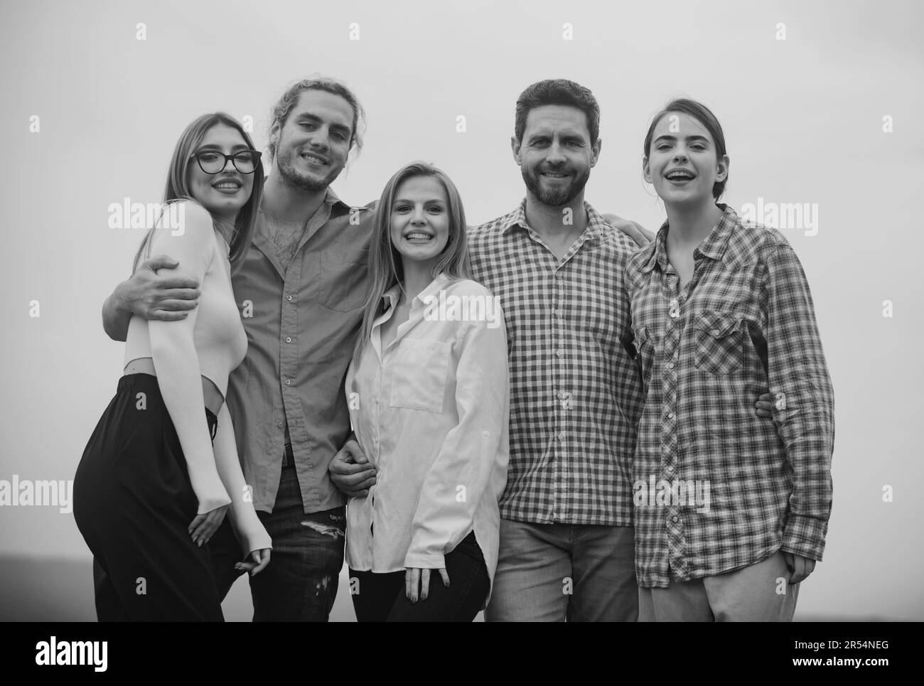 Company students best friends making selfies. Group young people posing together with thumb up ...